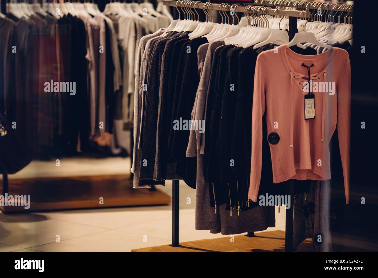 Women's clothing store. Women's clothes on rack in women's clothing ...