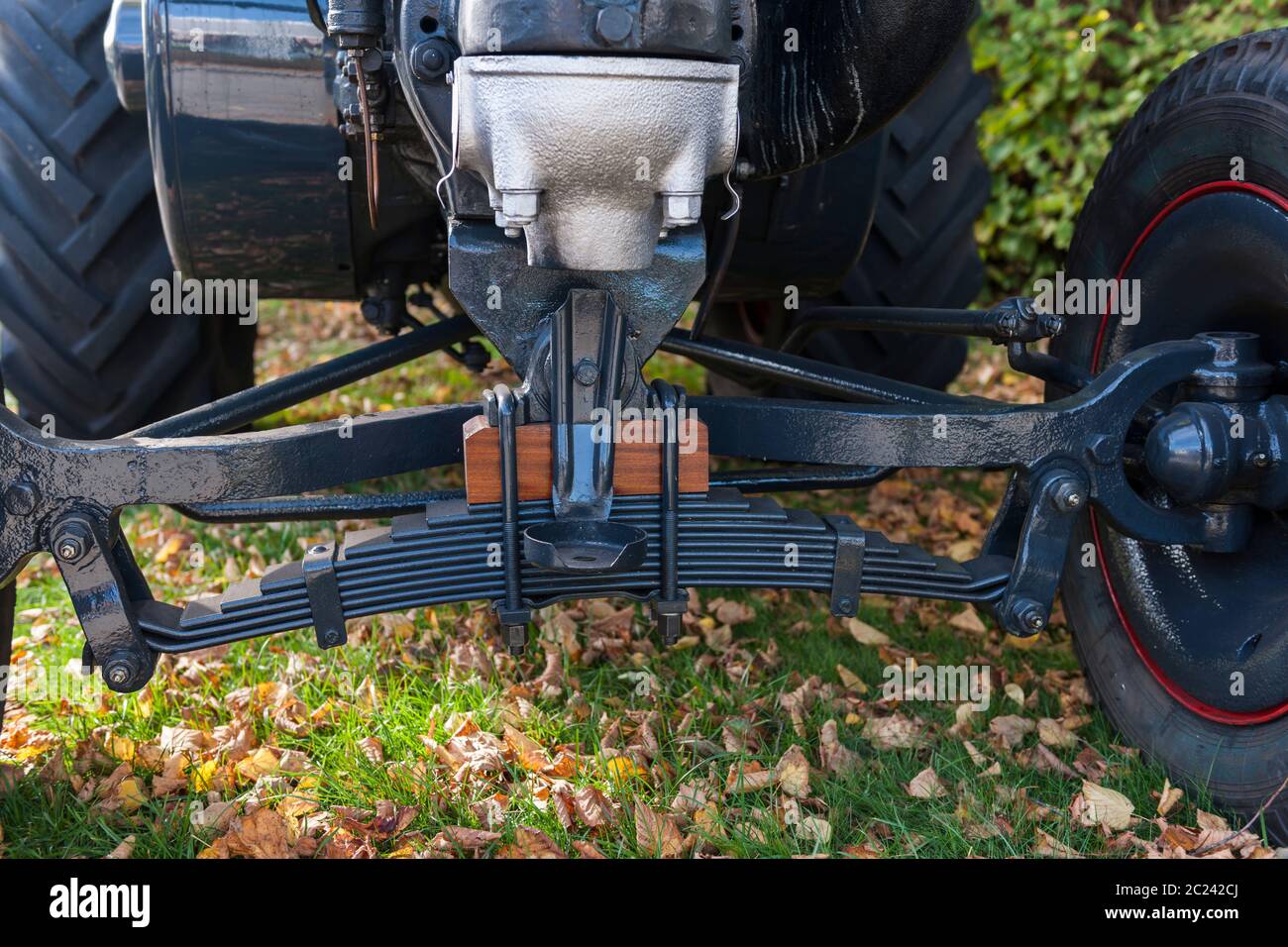 Frontal view of the front axle leaf spring with turned steering of an ...