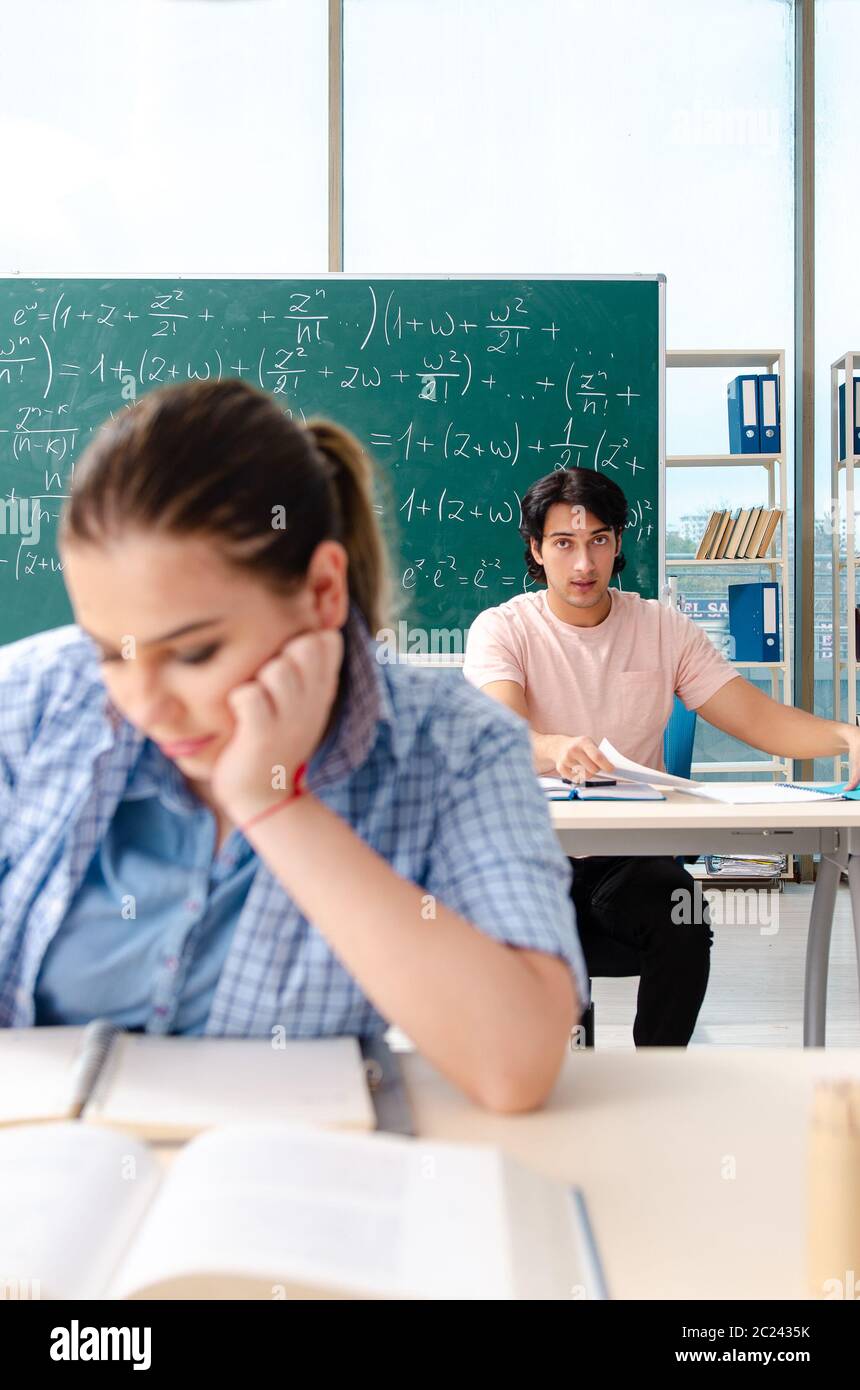 Young students taking the math exam in classroom Stock Photo - Alamy