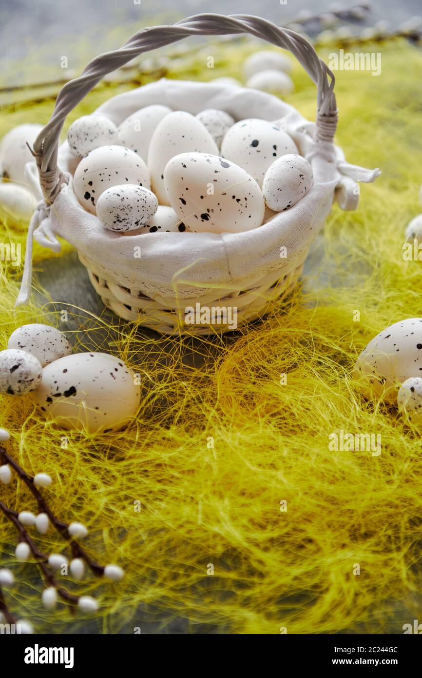 Easter white dotted Eggs in the nest and spring yellow grass Stock ...
