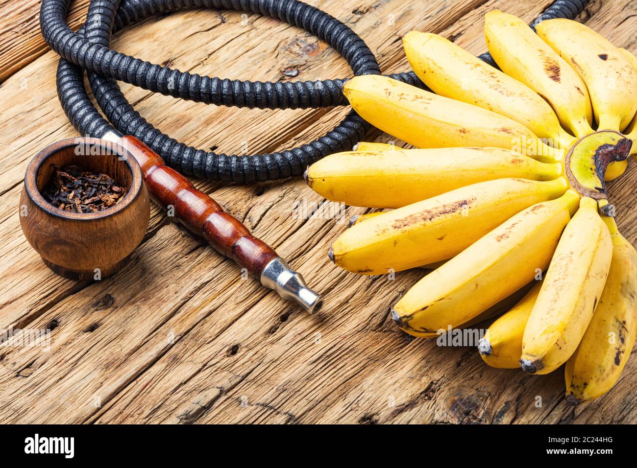 Tobacco shisha with banana aroma.Kalian with banana Stock Photo - Alamy
