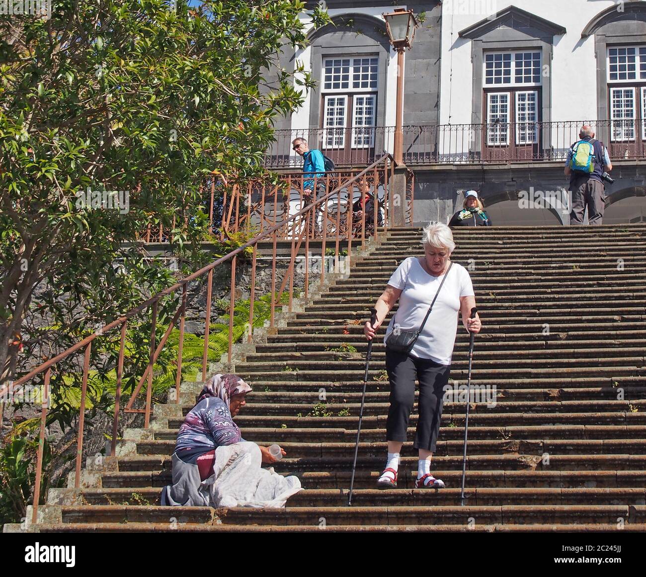 Old lady walking stairs hi-res stock photography and images - Alamy