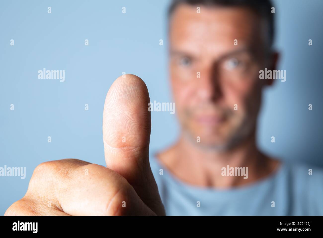 Man Doing Focusing Eye Exercise To Improve Vision Stock Photo - Alamy