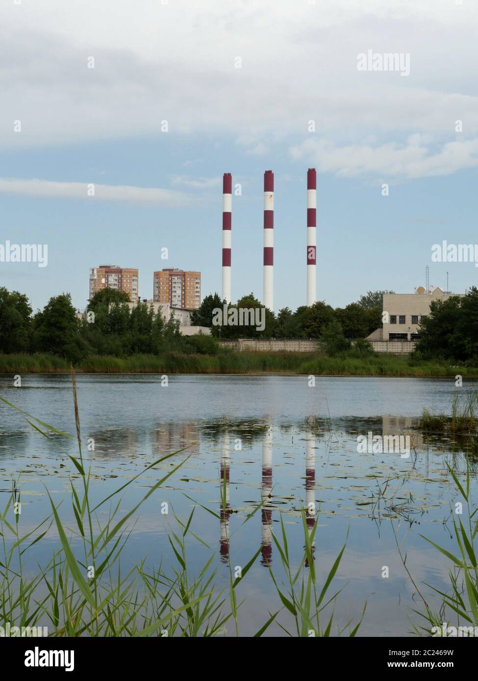 high chimneys of a power plant industrial landscape Stock Photo - Alamy