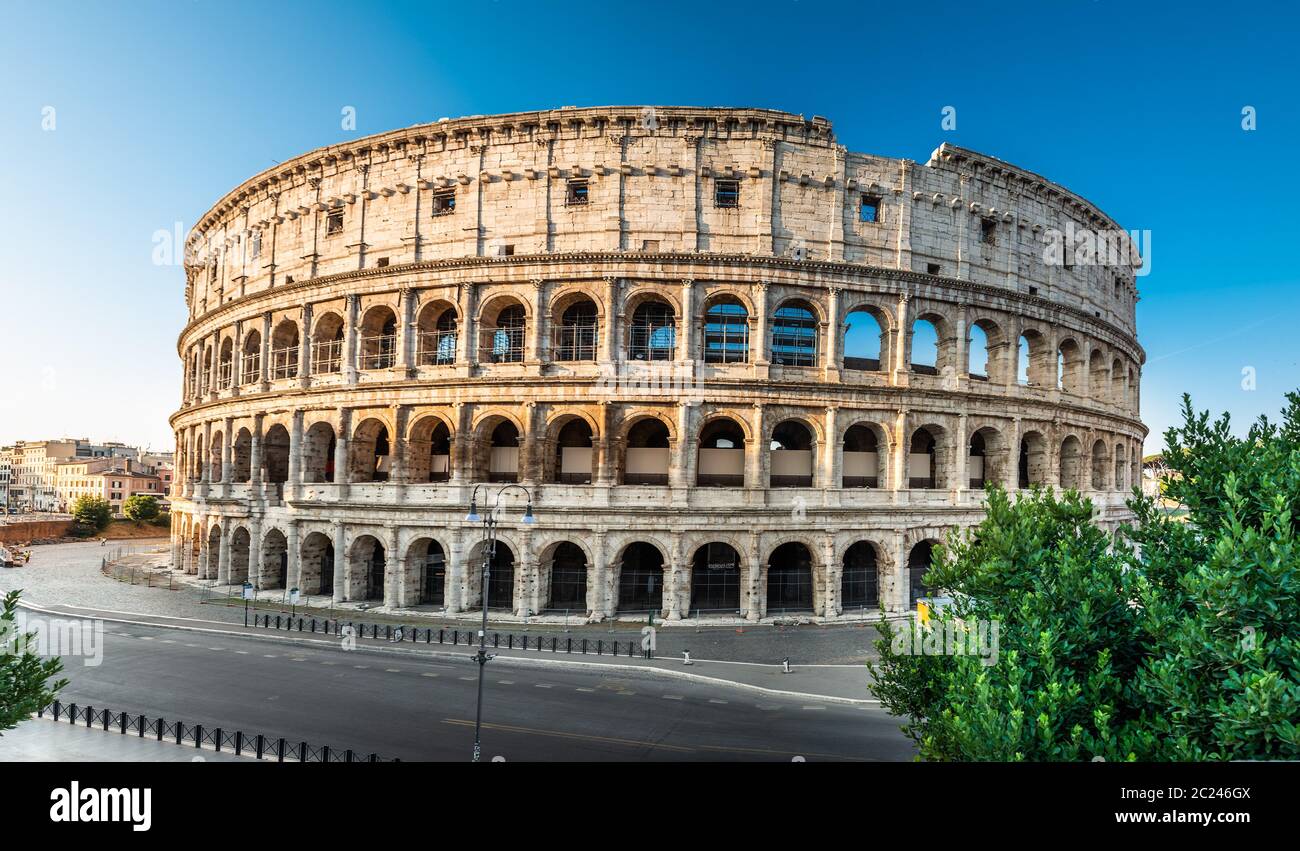 Panorama Of Colosseum Exterior At Sunrise In Rome, Italy Stock Photo ...