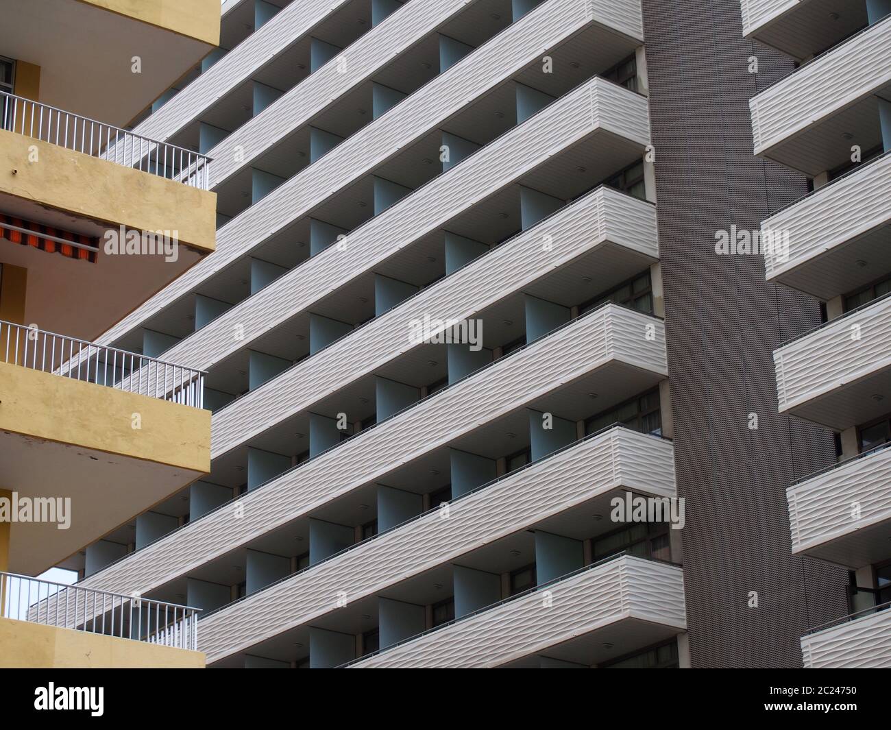 large modern highrise modern apartment buildings with angular balconies ...