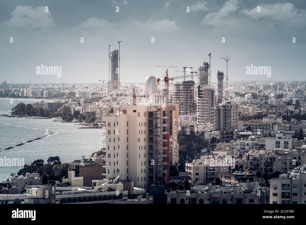 Modern high-rise residential and office buildings under construction ...