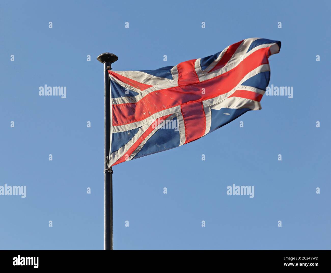 Union Jack Flag United Kingdom Flying at Pole Stock Photo - Alamy