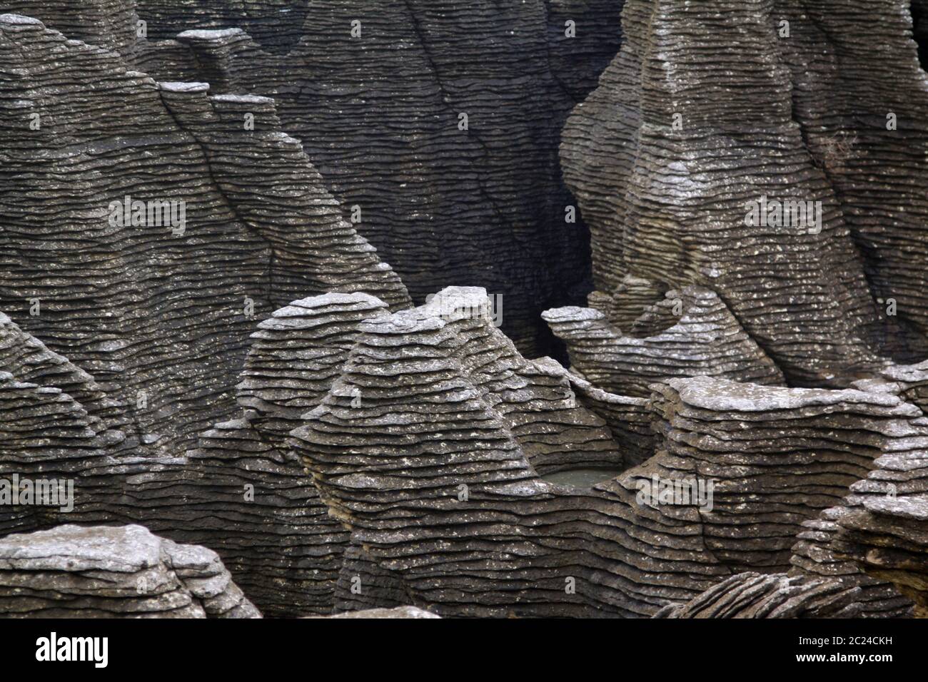 Texture of rock with individual layers visible in gray color Stock ...