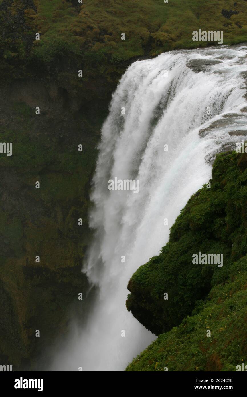 Quantity of water in the raging waterfall Stock Photo - Alamy
