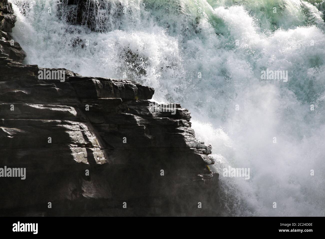 Water jumps over steps down the waterfall Stock Photo - Alamy
