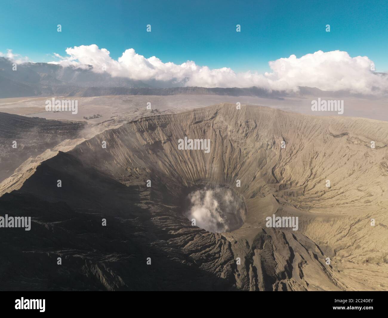 Cinematic drone shot aerial view of Mount Bromo crater with active ...