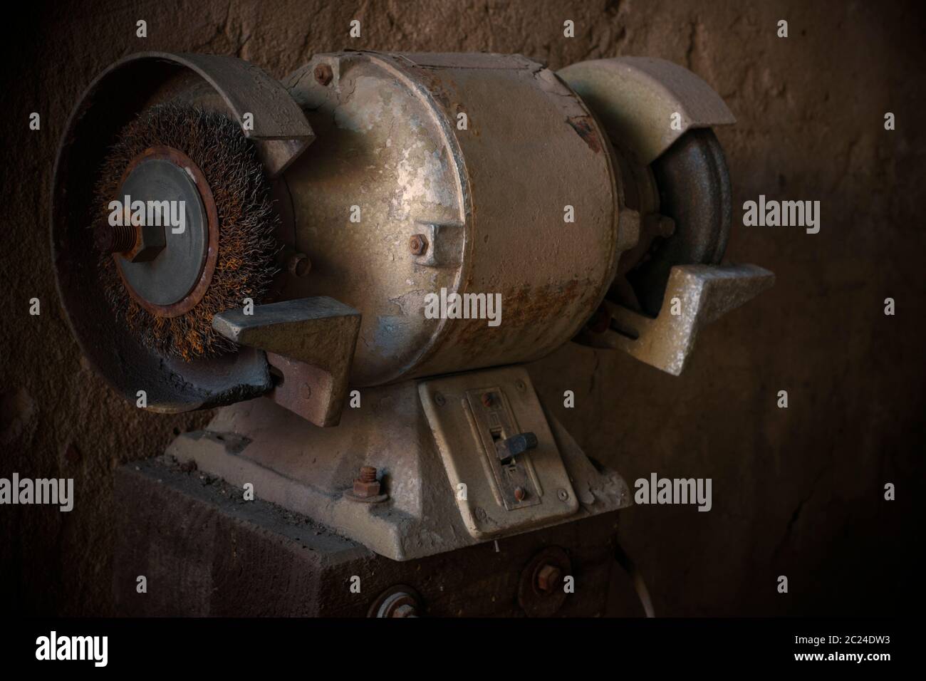 Old bench grinder in a car workshop in argentina Stock Photo - Alamy