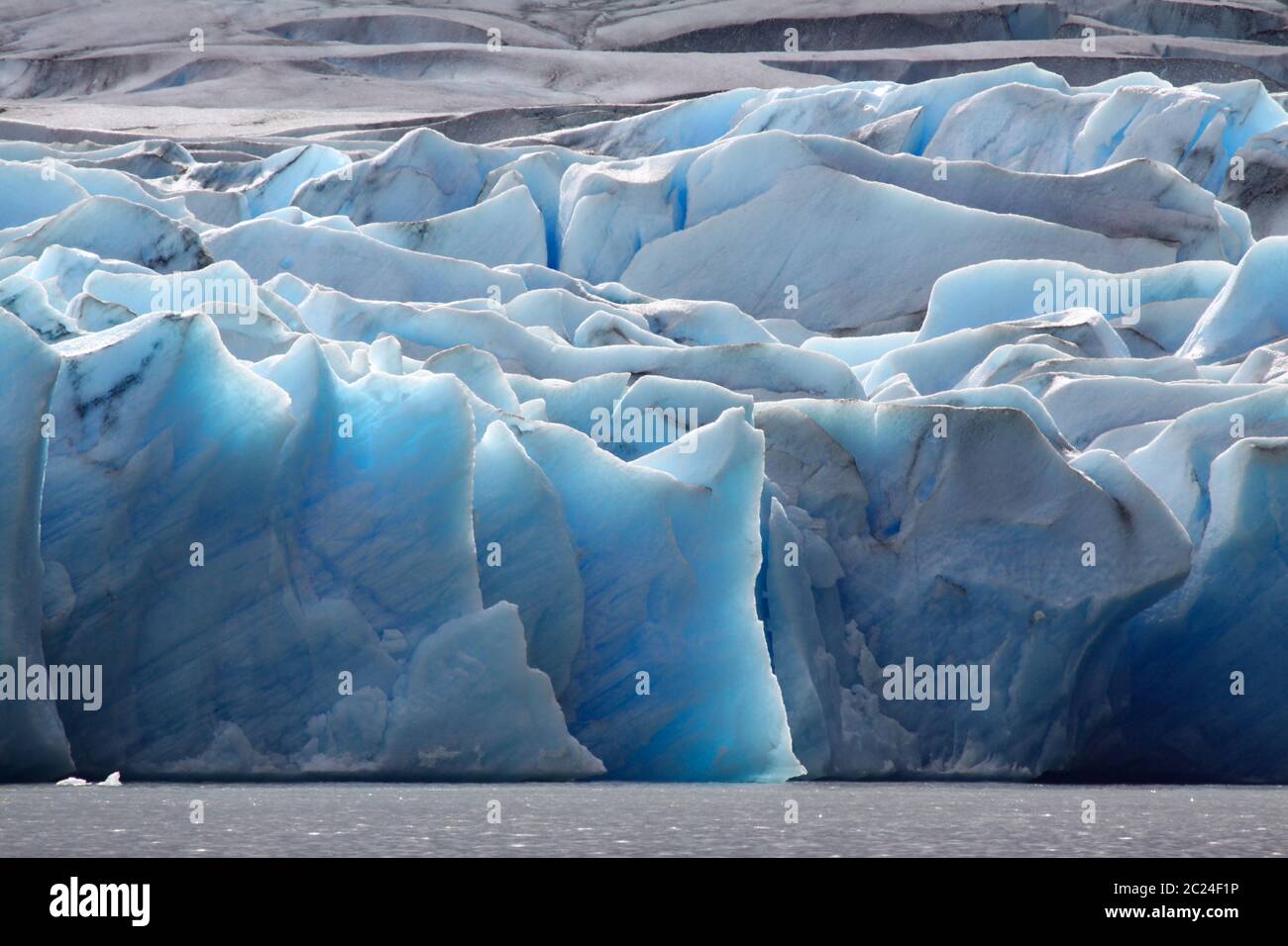 Blue shimmering ice of glacier in Patagonia Stock Photo - Alamy