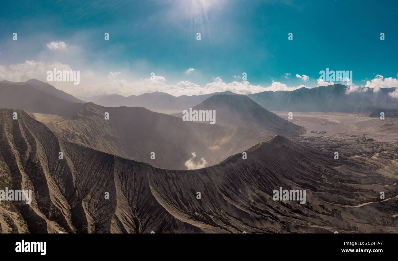 Cinematic shot aerial view of Mount Bromo crater with active volcano ...