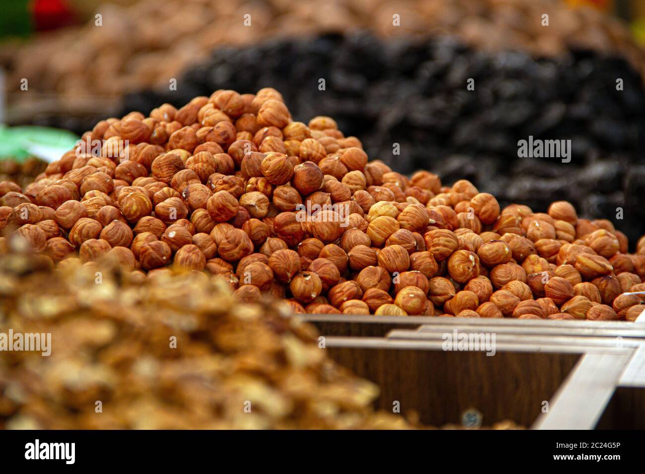 Dry nuts and other fruit snacks in the market Stock Photo - Alamy
