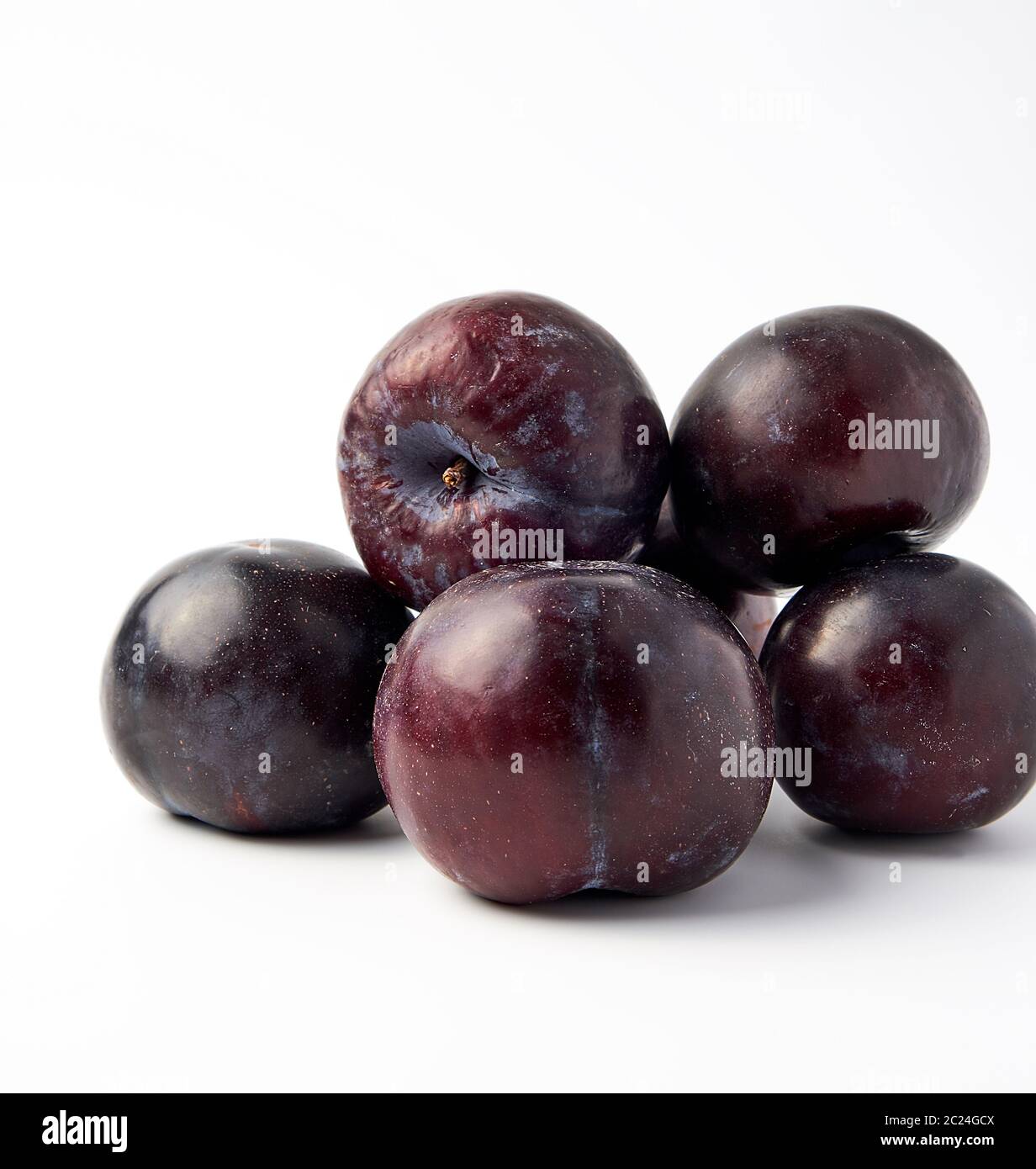 Plums on a white background hi-res stock photography and images - Alamy