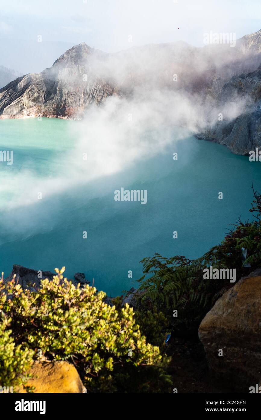 Aerial view of beautiful Ijen volcano with acid lake and sulfur gas ...