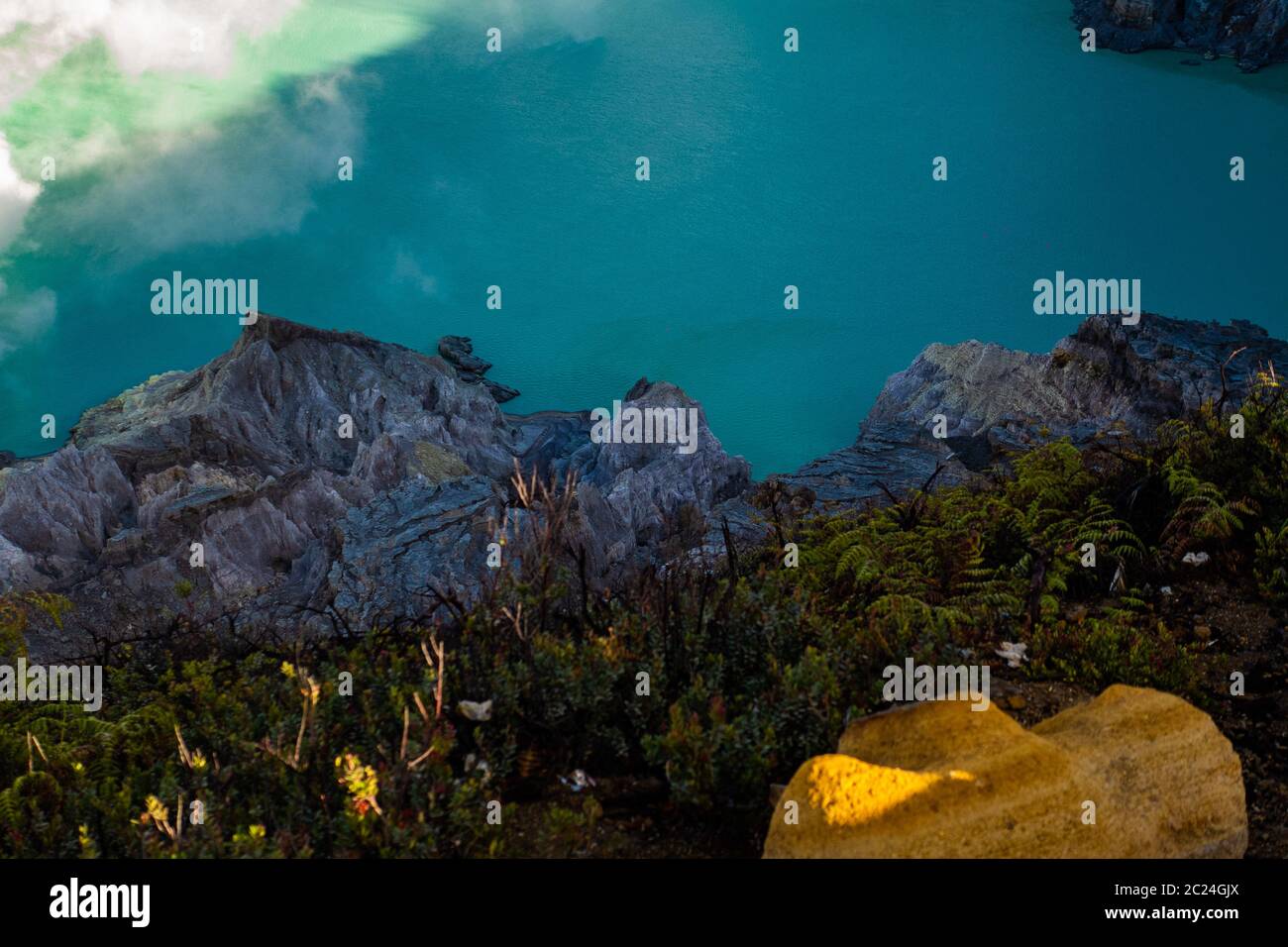 Aerial view of beautiful Ijen volcano with acid lake and sulfur gas ...