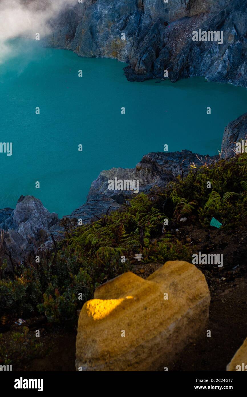 Aerial view of beautiful Ijen volcano with acid lake and sulfur gas ...