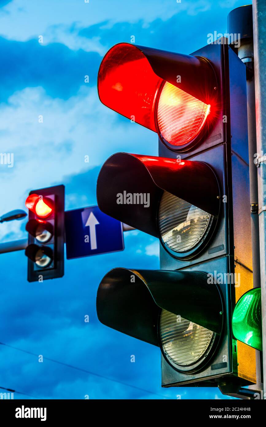 Traffic lights over urban intersection. Red light Stock Photo - Alamy