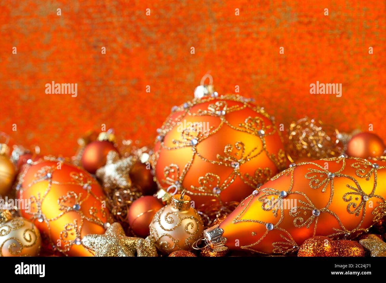 Elegant and colorful Christmas ornaments in a ombre orange copper color ...