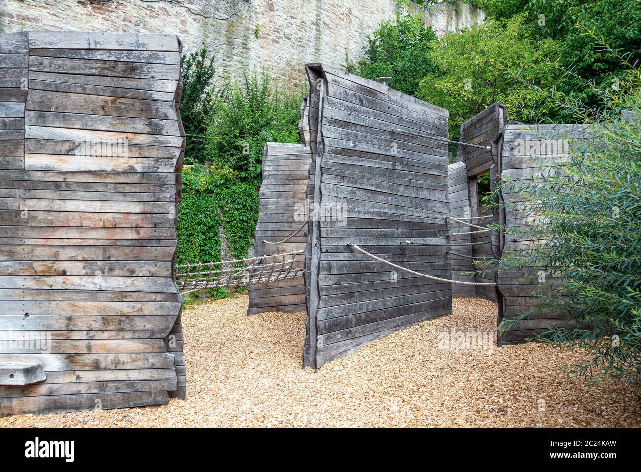 Adventure playground - labyrinth made of wooden walls with ropes Stock ...