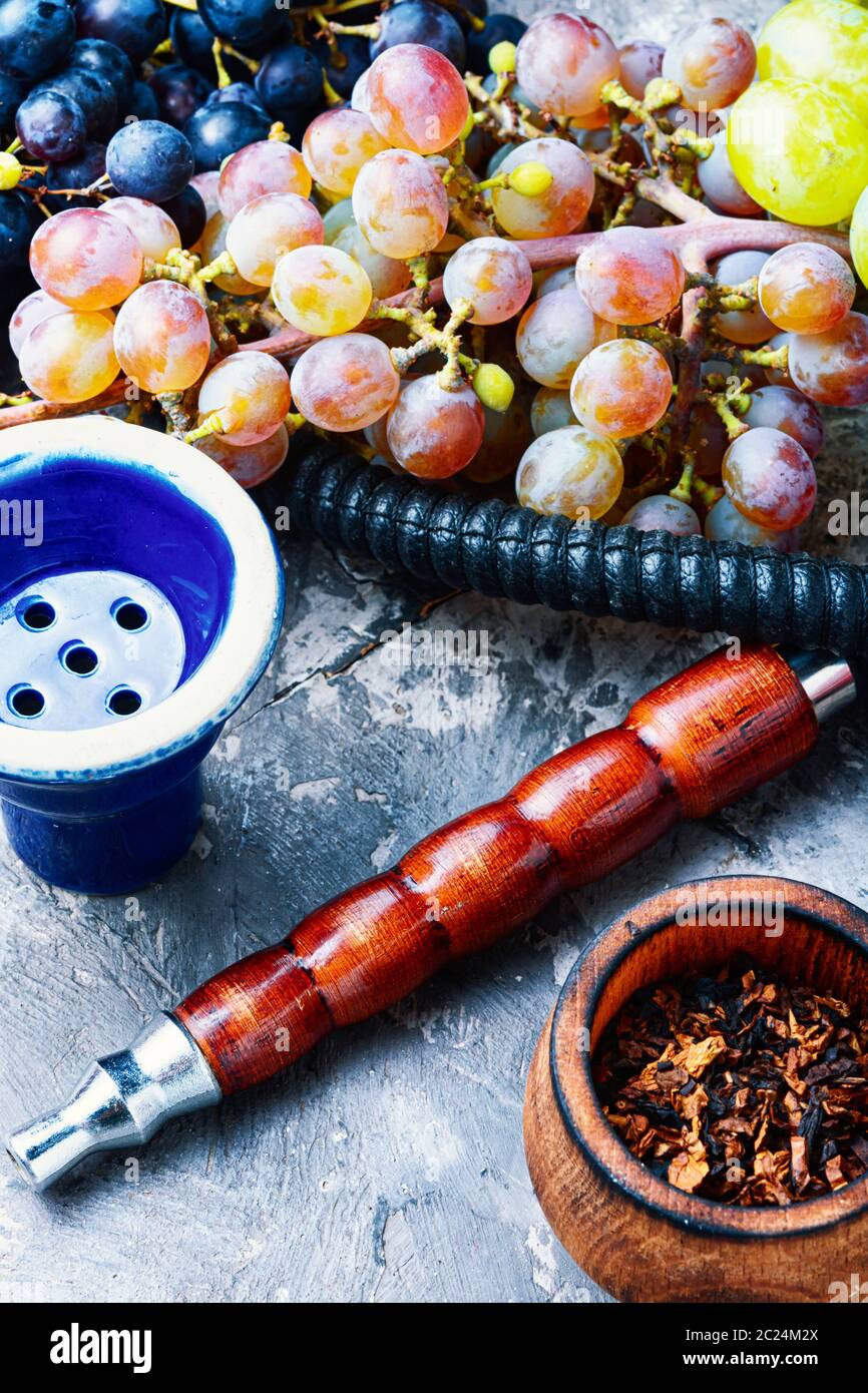 Tobacco shisha with grapes flavor.Nargile with grapes.Turkish fruit hookah tobacco Stock Photo ...