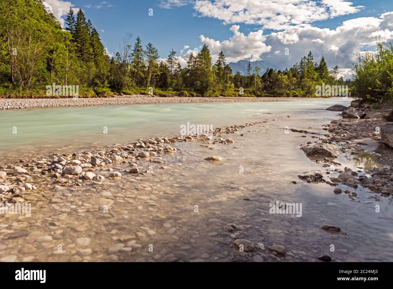 Flowing water of the river Isar in Bavaria Stock Photo - Alamy