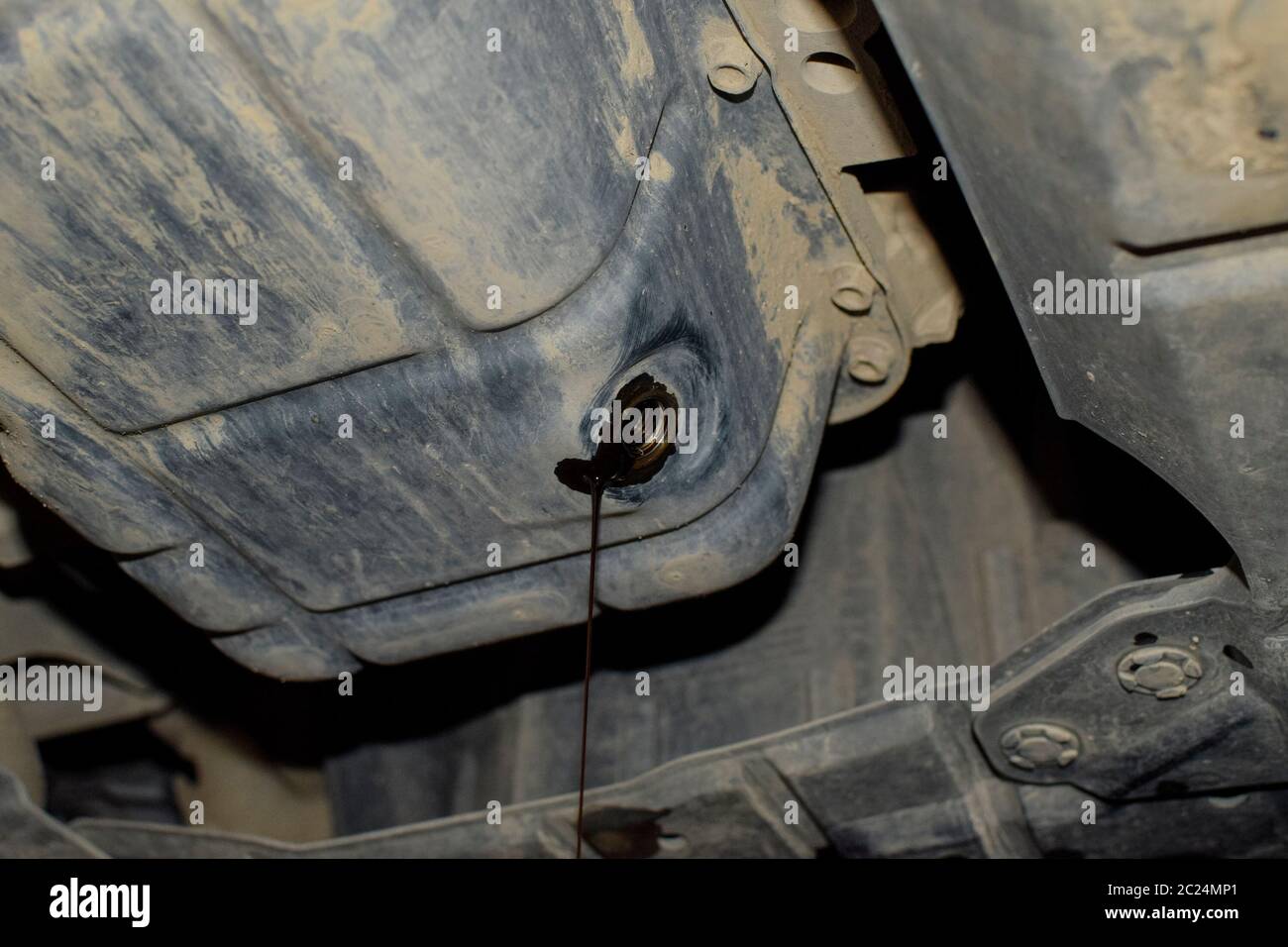 Drain the old oil from the engine through the drain plug. Changing the ...