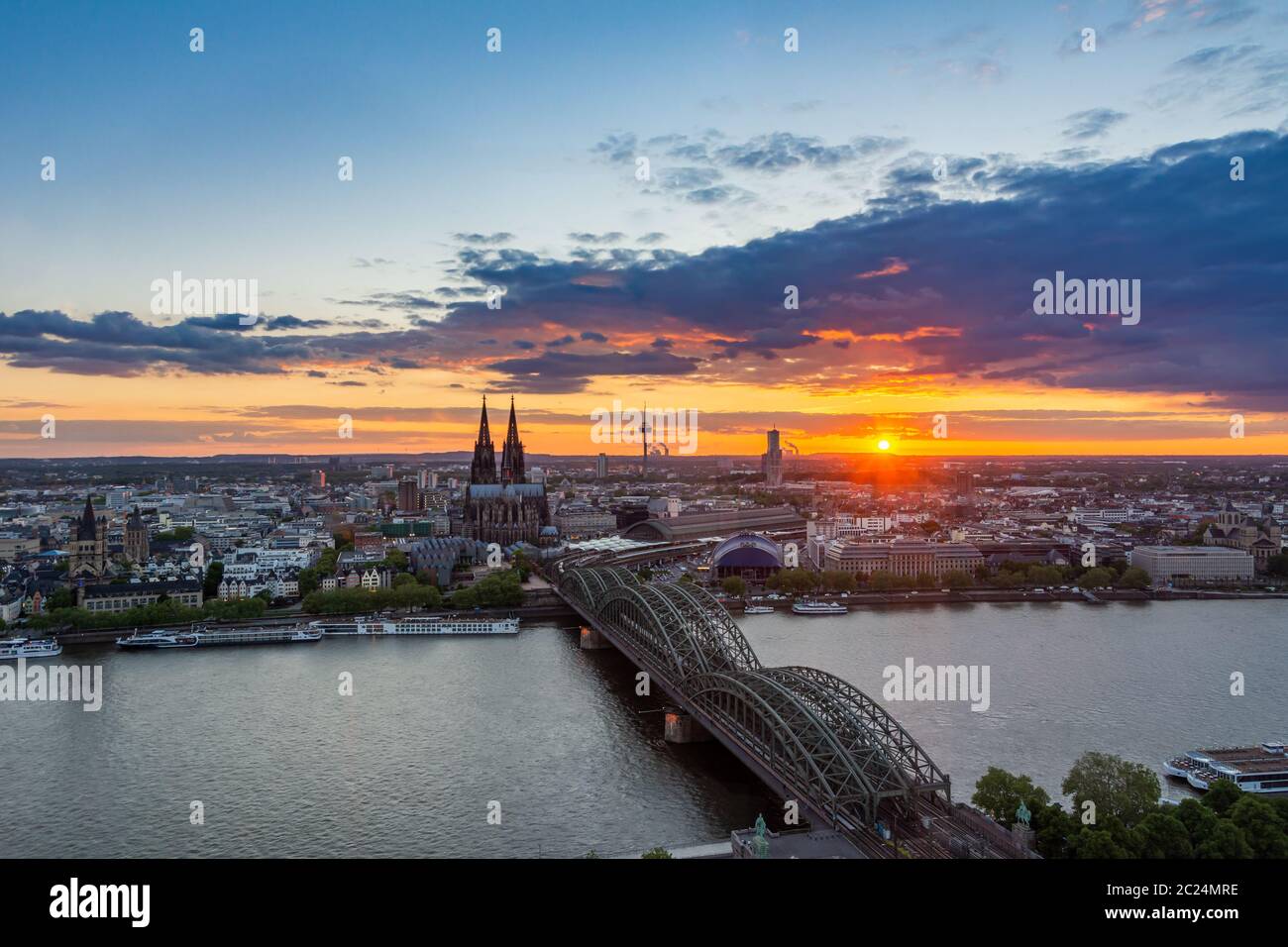 Cityscape of Cologne and the river Rhine during sunset Stock Photo - Alamy