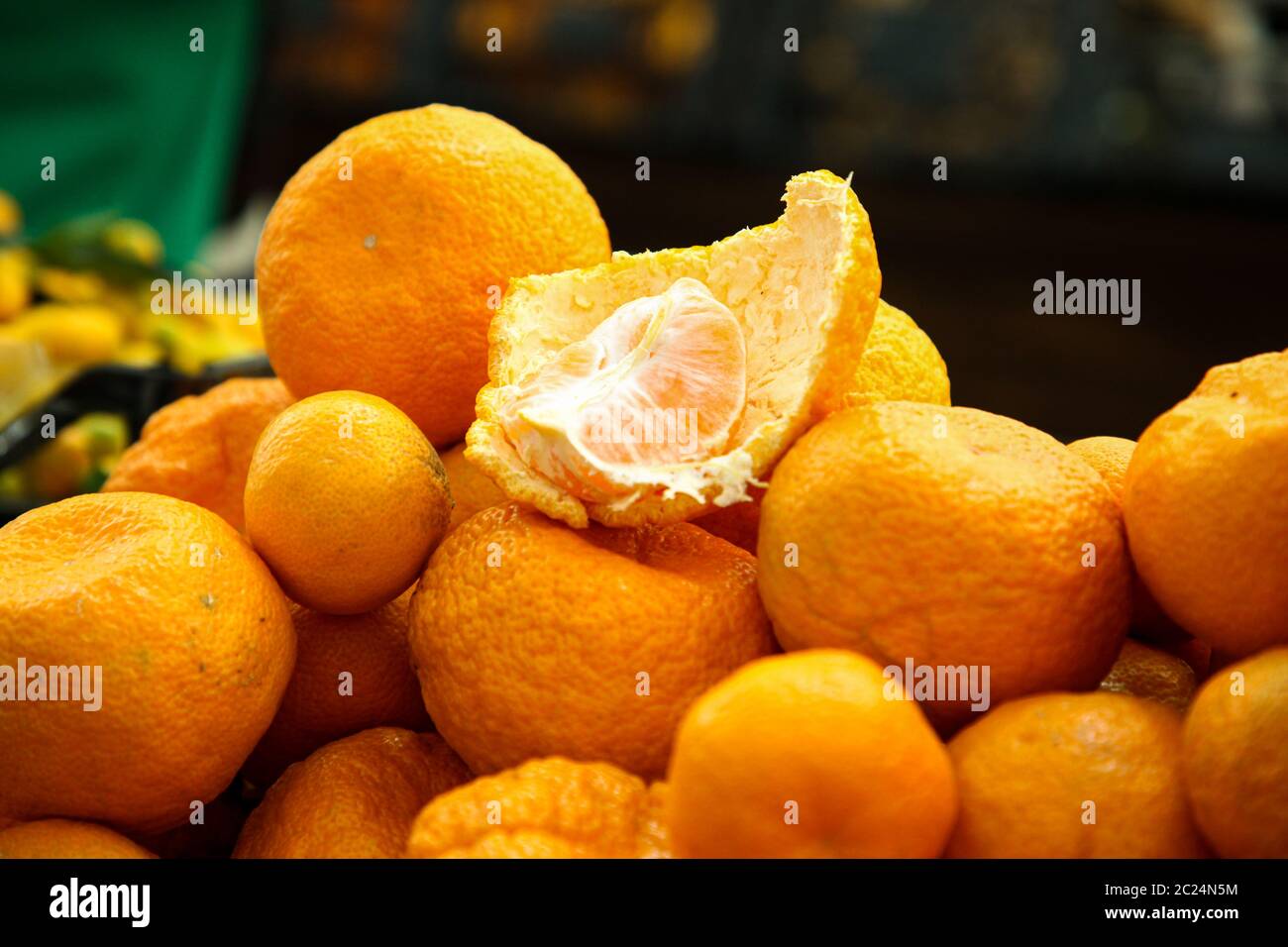 Whole and peeled mandarin oranges Stock Photo - Alamy