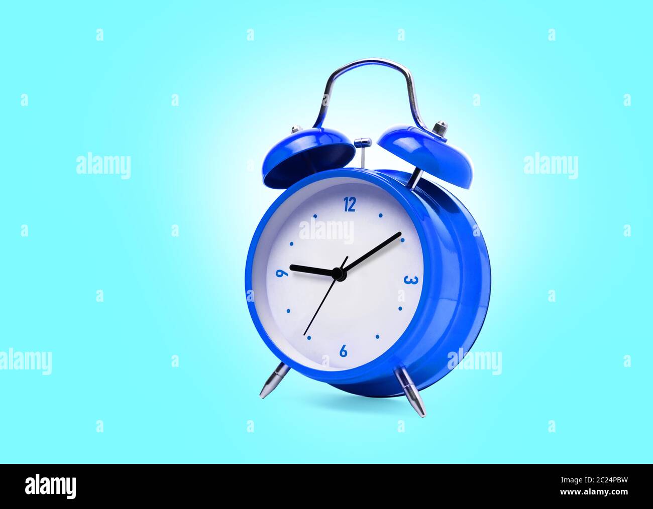 Blue alarm clock isolated on blue background. With clipping path Stock ...