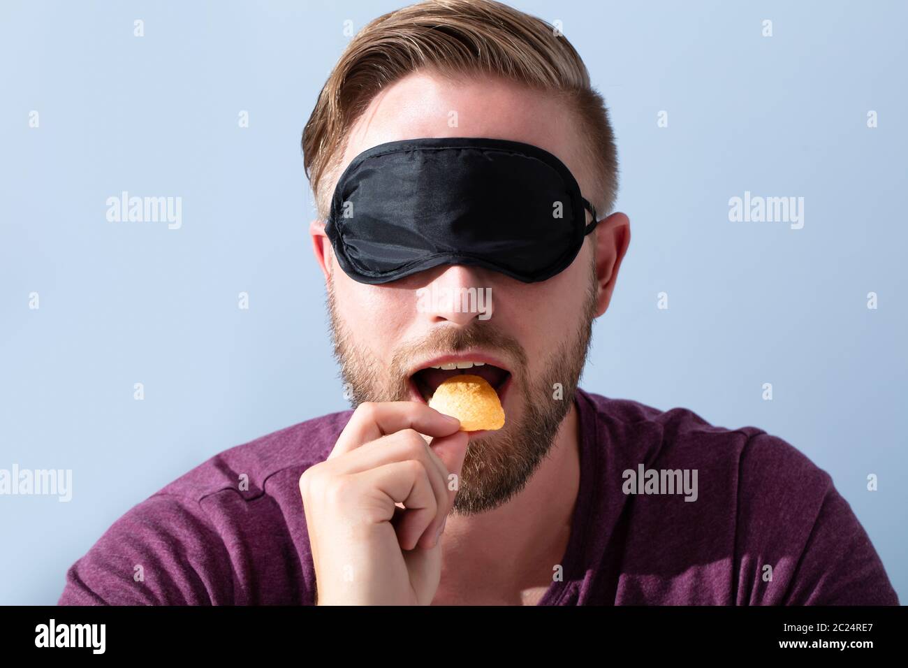 Man tasting food finger hi-res stock photography and images - Alamy