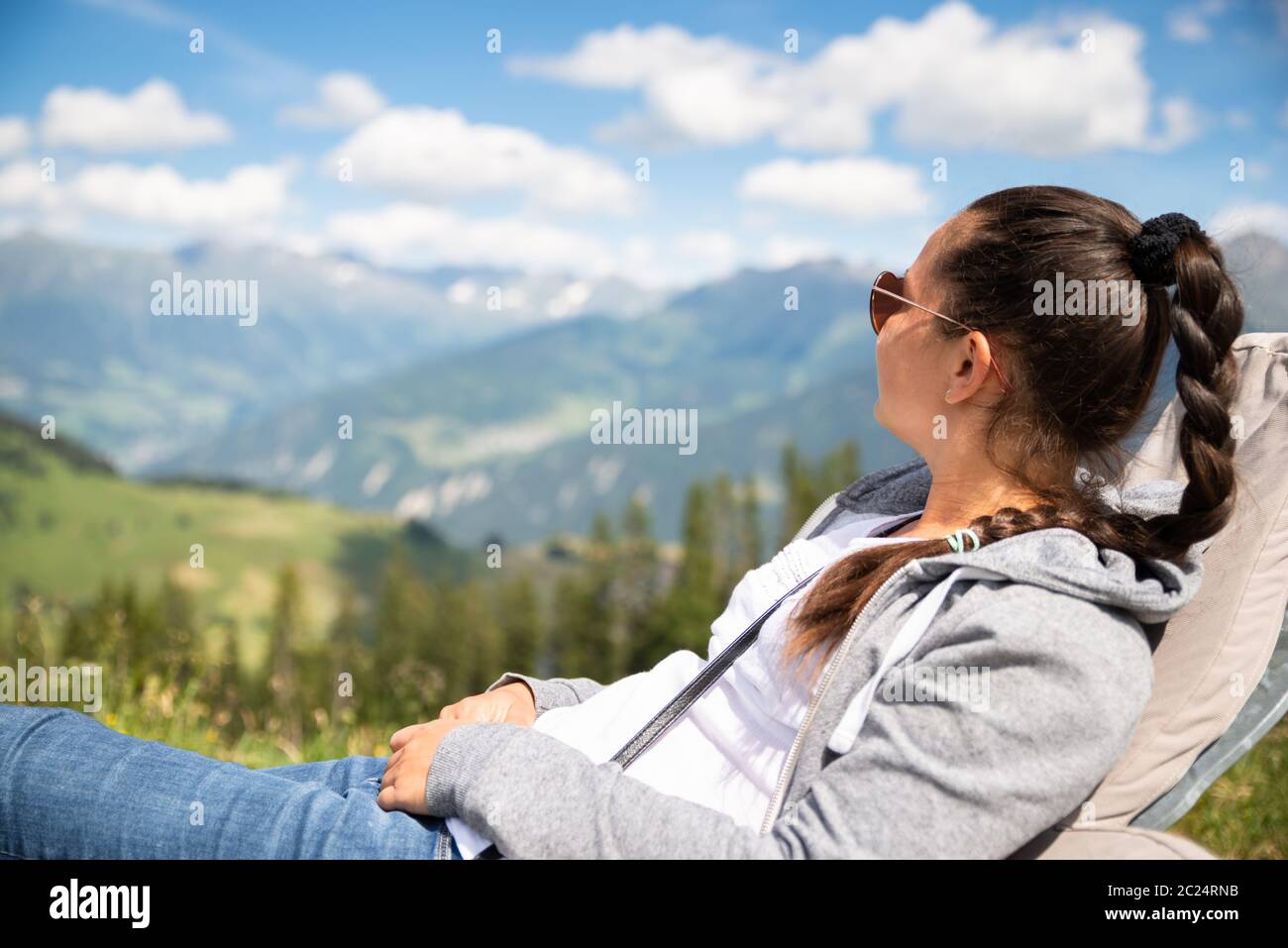 Woman relaxing in sun hi-res stock photography and images - Alamy