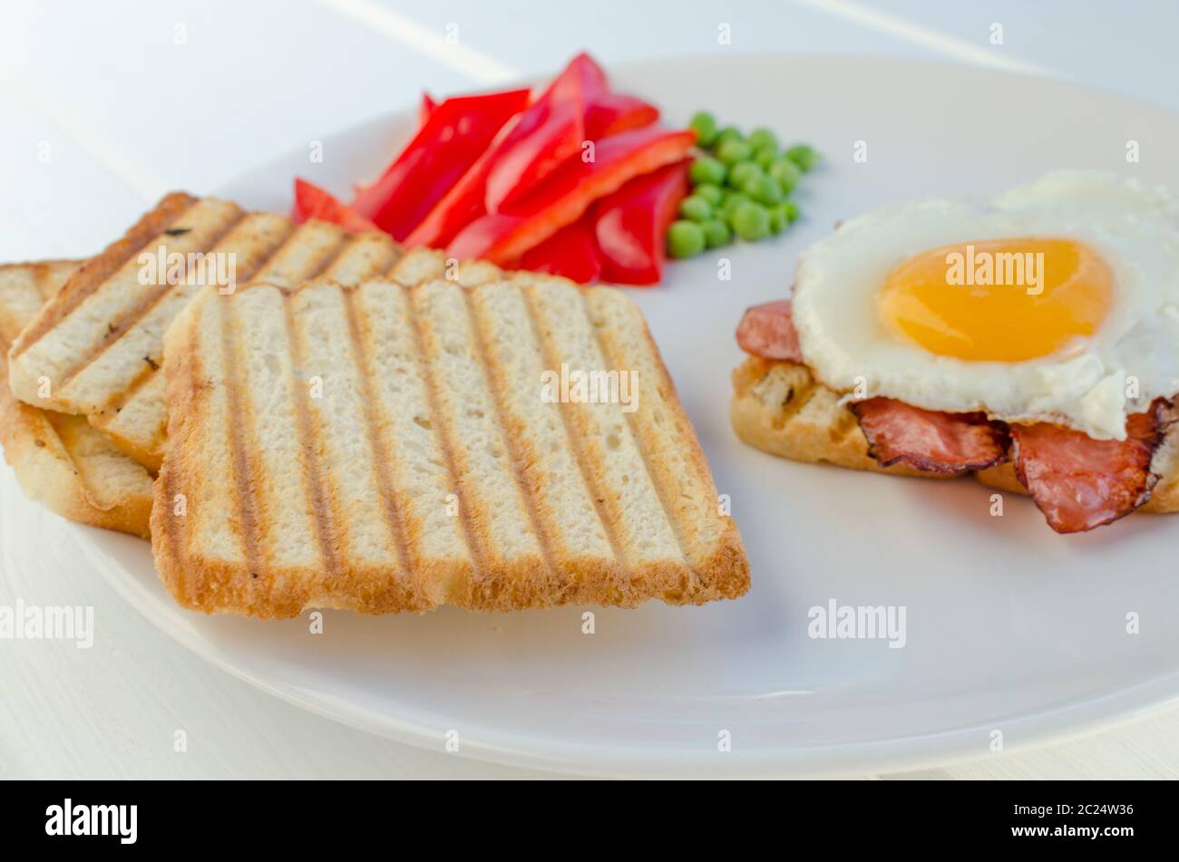 Fresh breakfest - ham, eggs, vegetable and toast homemade Stock Photo ...
