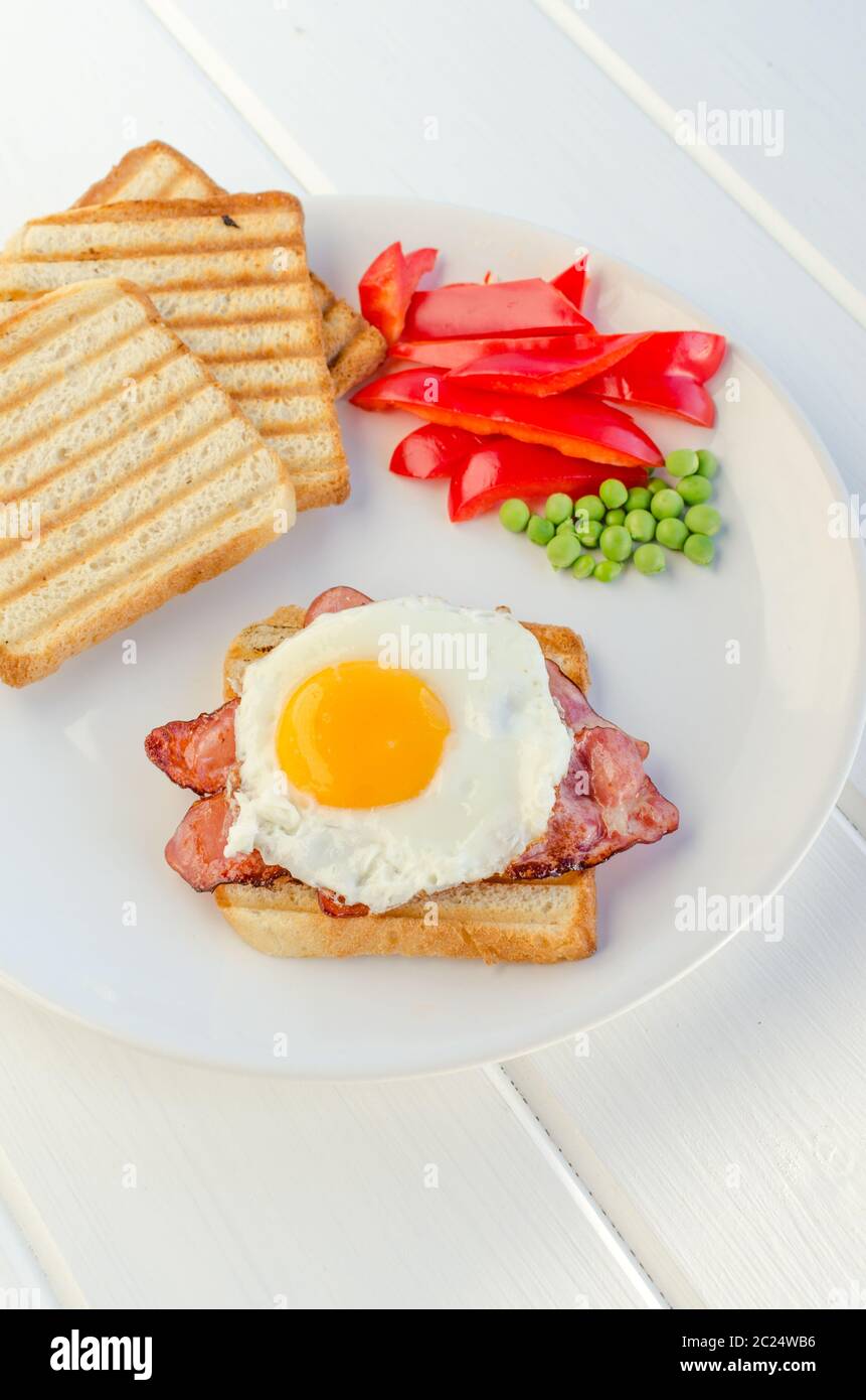Fresh breakfest - ham, eggs, vegetable and toast homemade Stock Photo ...
