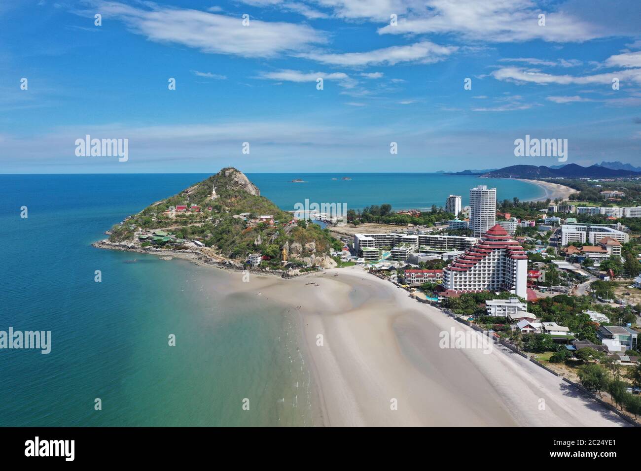 Beautiful coastal view of a beach with a mountain backdrop Stock Photo ...