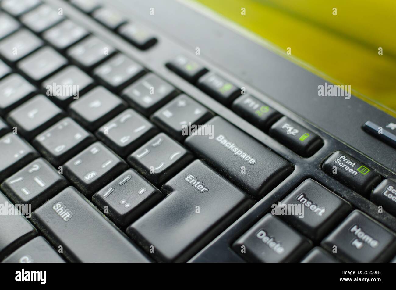 Keyboard with enter button, with light from left side Stock Photo - Alamy