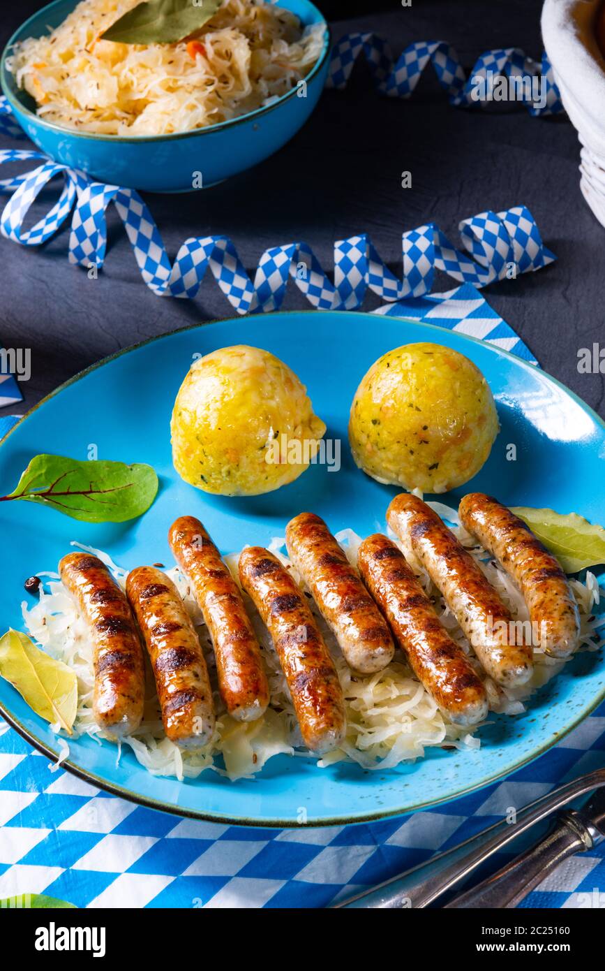 thuringian bratwurst with sauerkraut and dumplings Stock Photo - Alamy