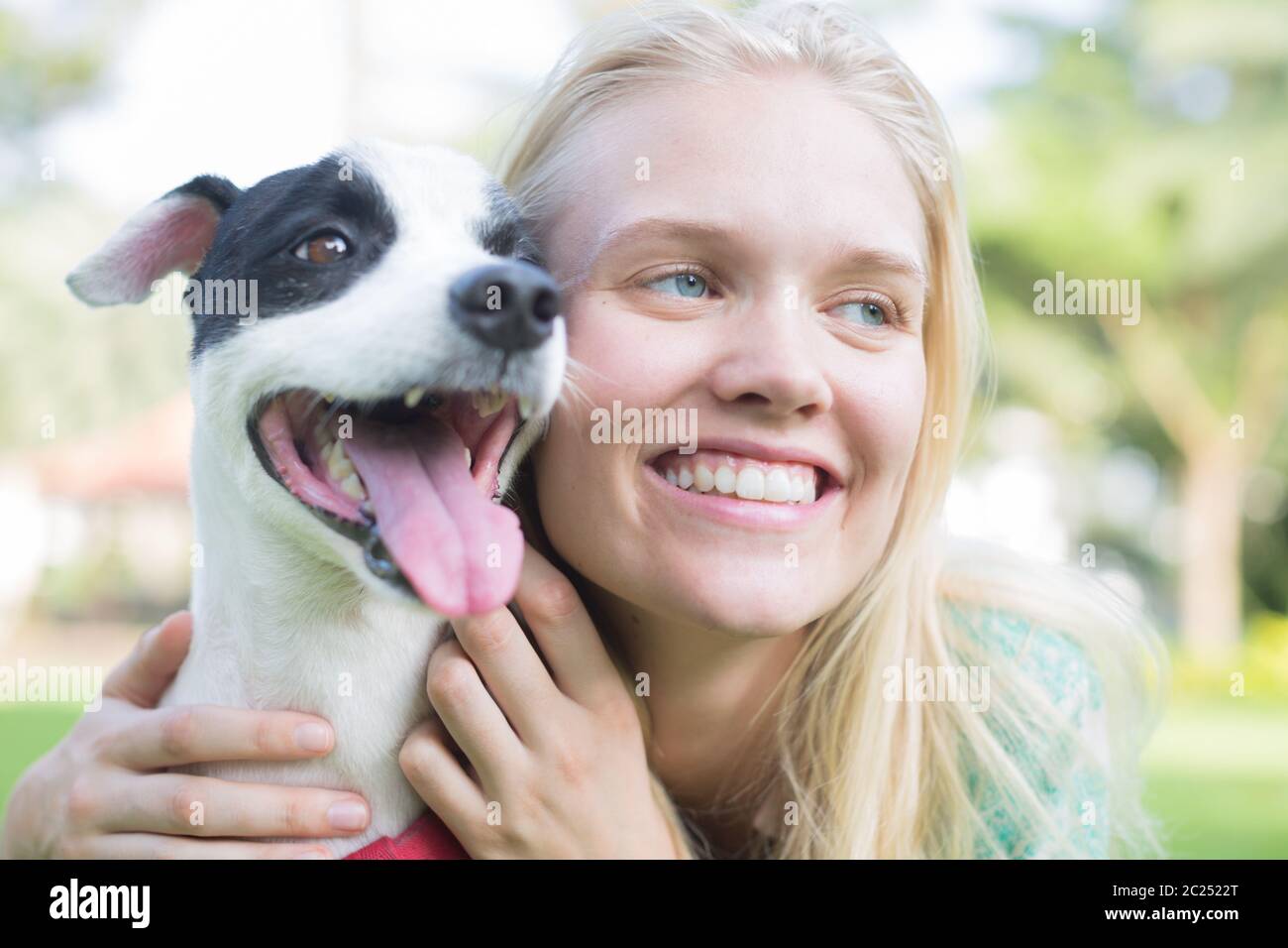 dog and owner companionship and love. woman and pet portrait Stock ...