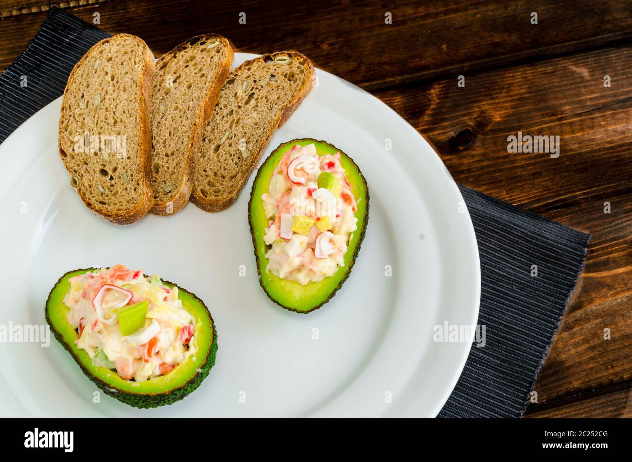 Stuffed with avocado with surimi sticks, paprika mayonnaise with bio ...