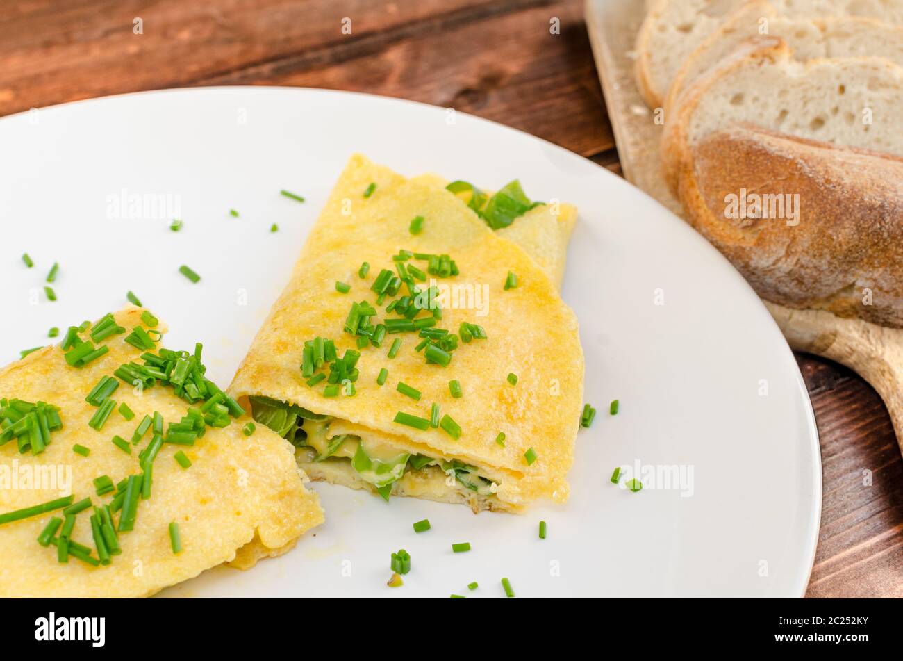 Fresh french omelette with spring onion and chive Stock Photo - Alamy