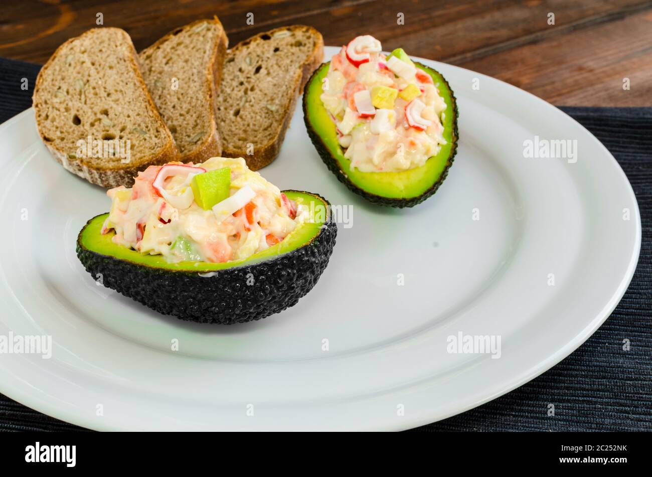 Stuffed with avocado with surimi sticks, paprika mayonnaise with bio ...