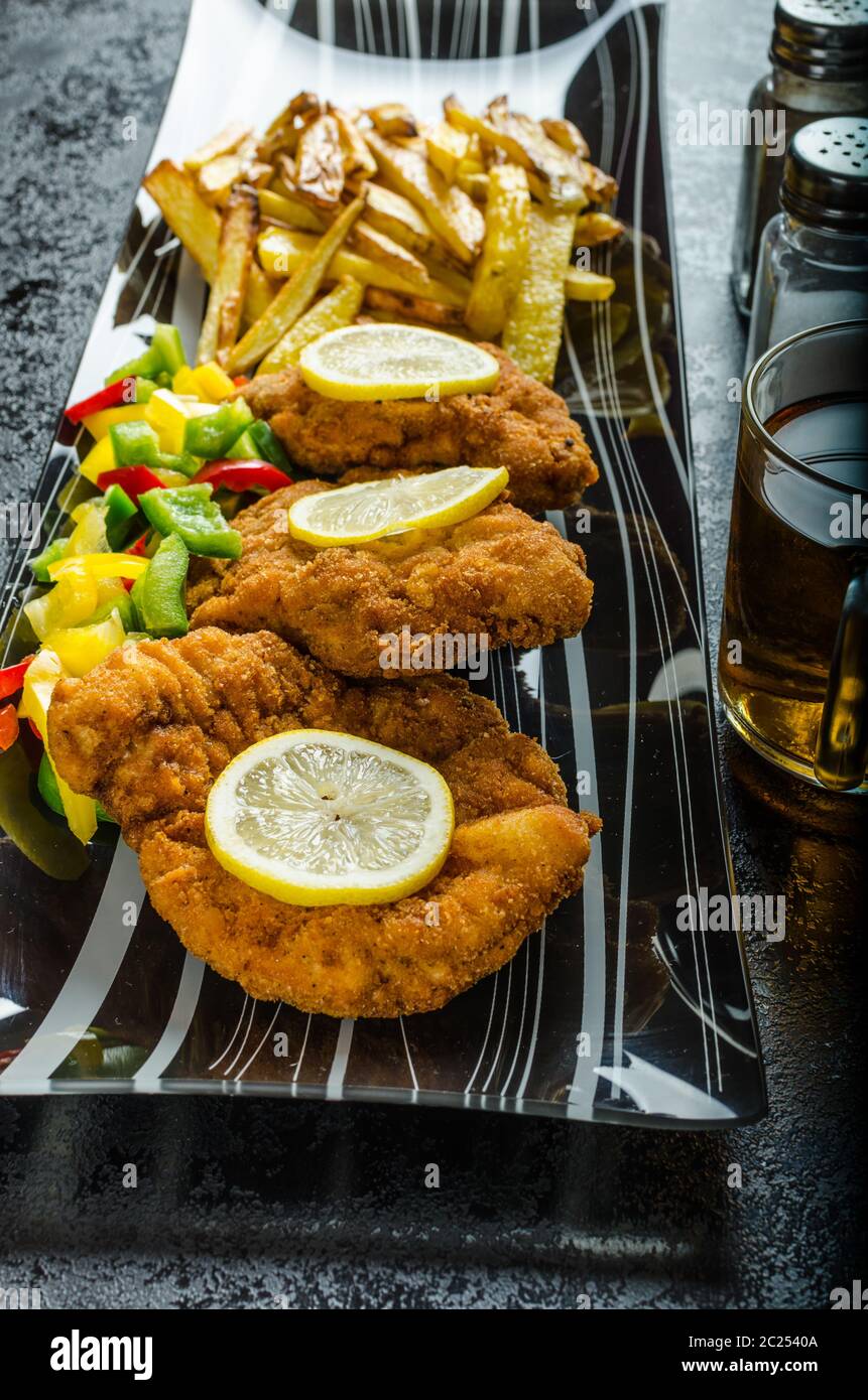 Schnitzel with french fries, homemade, platter, czech beer, vegetable ...