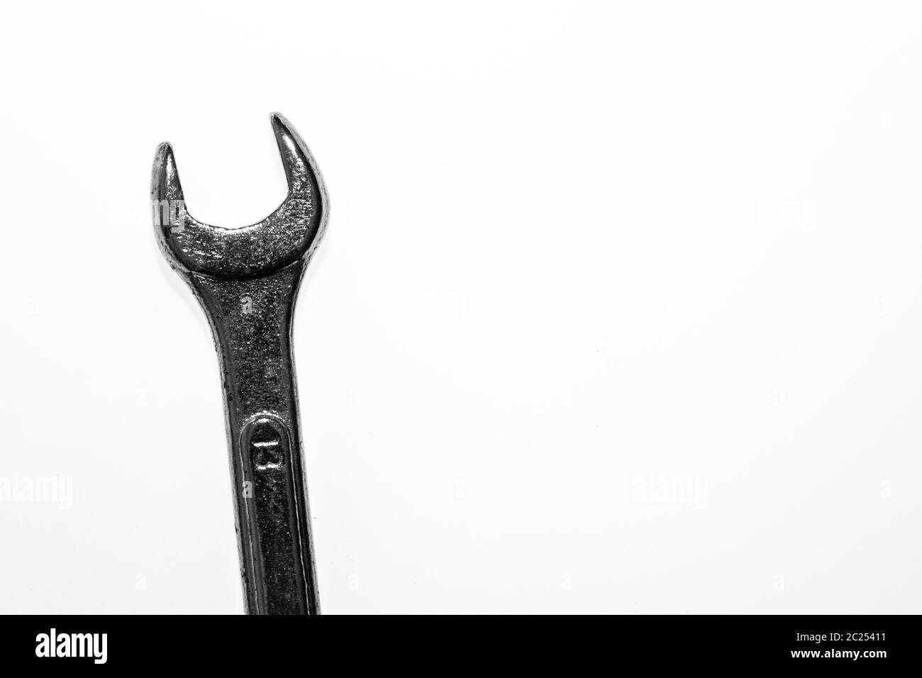 A single wrench on a white background Stock Photo - Alamy