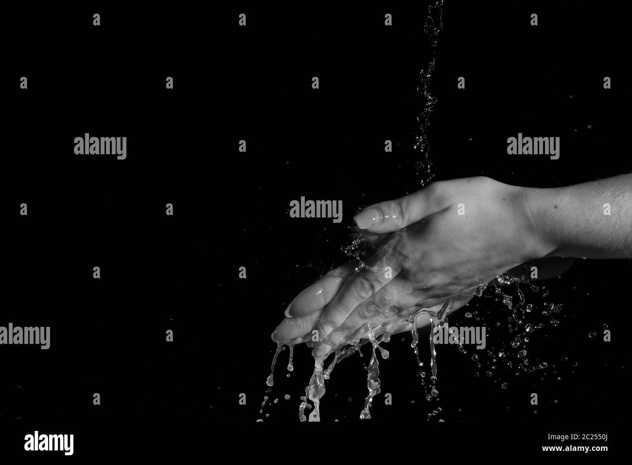 Some washing hands with water splashing in black and white Stock Photo ...