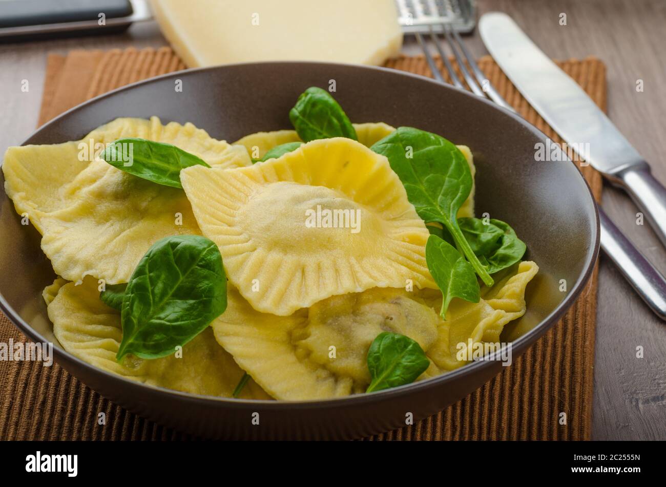 Homemade ravioli stuffed with spinach and ricotta, all home prepared ...