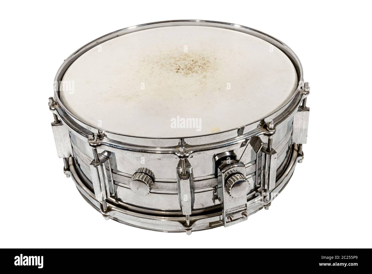 Old silver Snare drum stands on the ground isolated on white Stock ...
