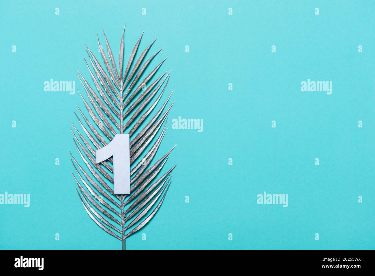Number one shape with silver palm leaves on blue background. Summer ...